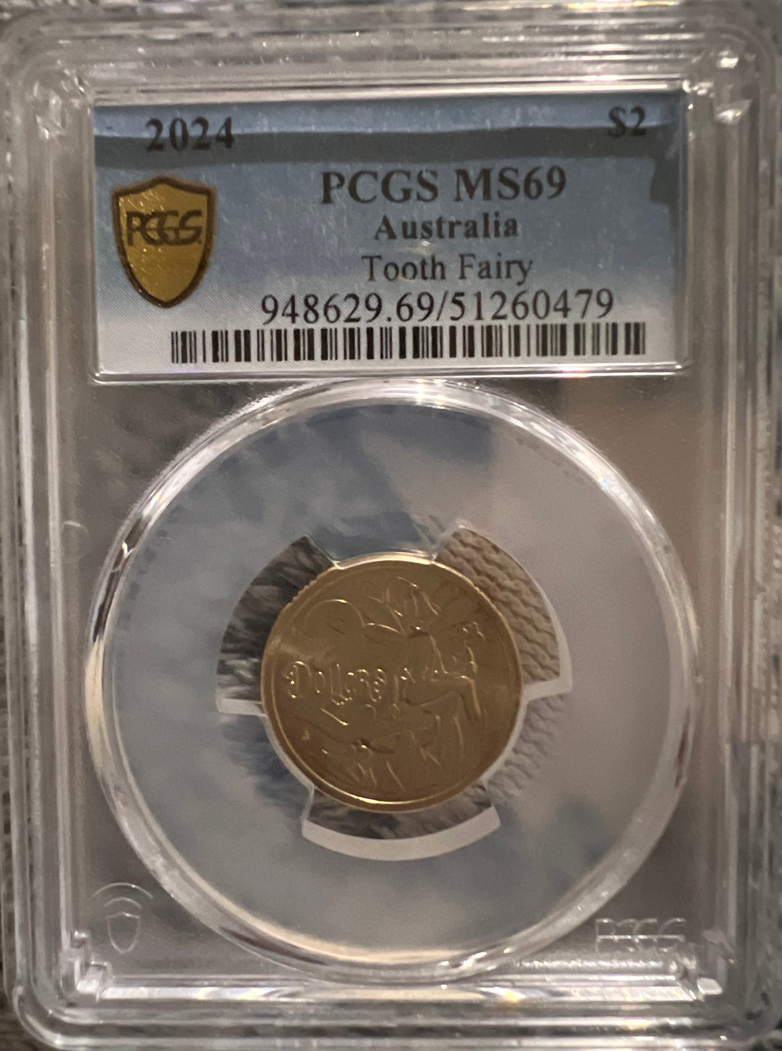 2024 $2 Tooth Fairy Coin Graded MS69 – Cosican Coins